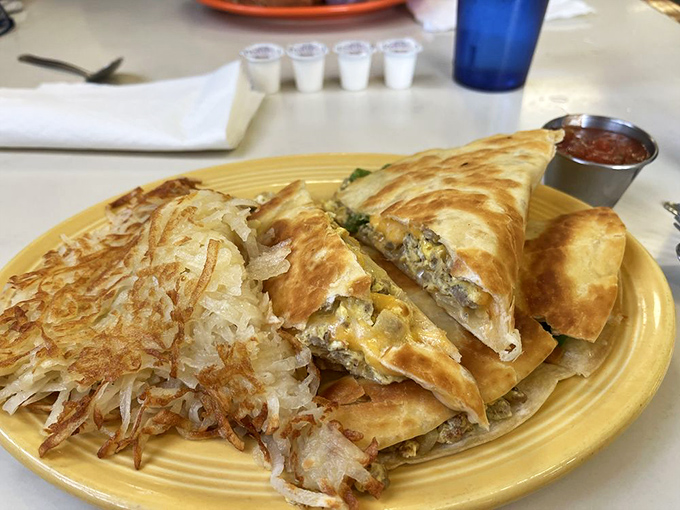 Breakfast quesadilla with crispy hash browns—proof that morning excellence comes in many delicious forms.