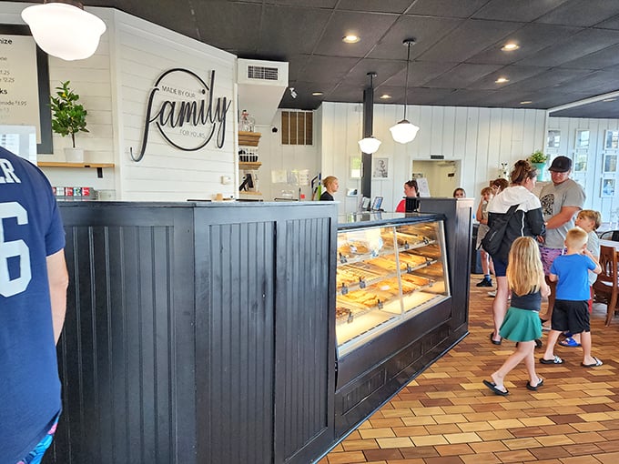 The counter where dreams come true. That "Made by our family for yours" sign isn't just decoration—it's the Dewster's philosophy in seven perfect words.