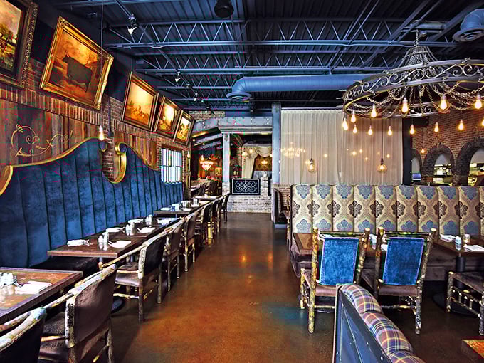 Blue velvet booths and elegant lighting create dining spaces that feel like exclusive clubs. Each table seems to have its own personality and story.