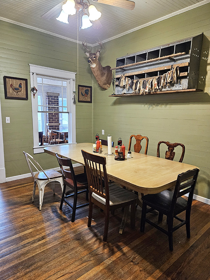Green walls, wooden chairs, and a mounted deer head—the rustic dining room where calories don't count and meat sweats are badges of honor.