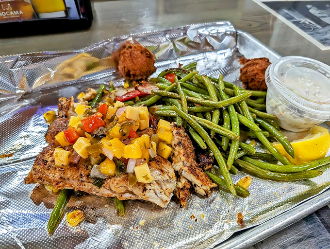 This isn't just grilled fish—it's Florida sunshine on a plate, complete with mango salsa bringing the party.
