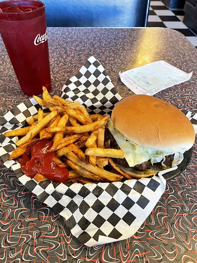 Those jalapeños aren't just toppings—they're daredevils performing stunts on a beef and cheese canvas. Caution: delicious danger ahead.