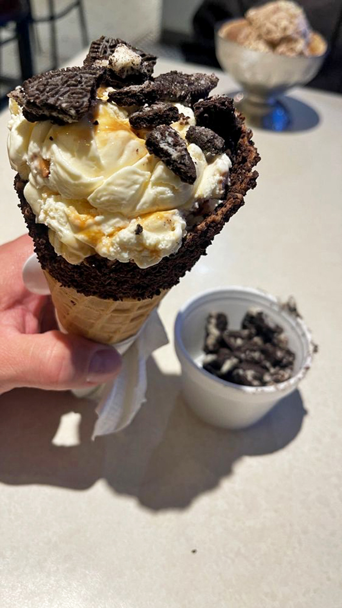This isn't just cookies and cream—it's a structural marvel of vanilla ice cream, chocolate cone, and Oreo chunks that deserves architectural recognition.