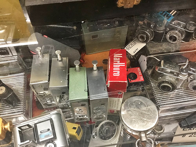 Spy cameras, miniature marvels, and mechanical wonders fill every inch of these shelves—each one a chapter in photography's fascinating story.