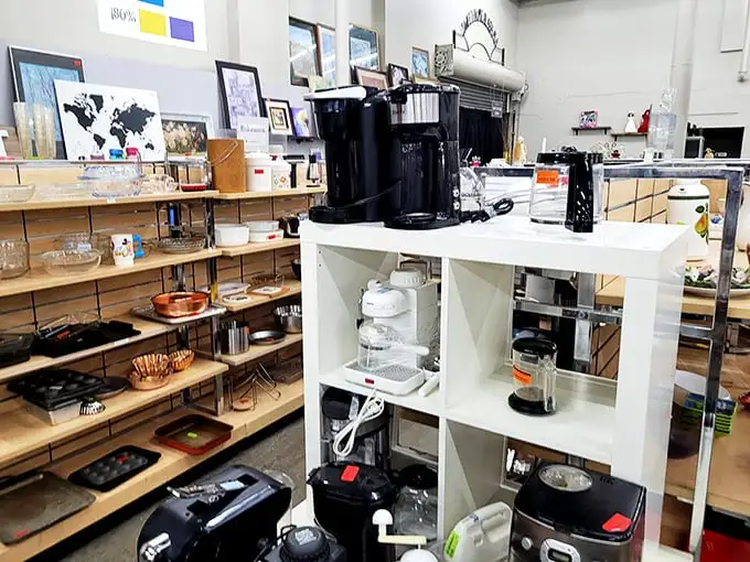 Kitchen gadget graveyard or appliance resurrection center? These shelves offer second chances to coffee makers, blenders, and the occasional bread machine.