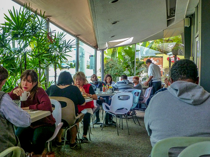 The patio where time slows down just enough to savor both your coffee and conversation without checking your phone once.