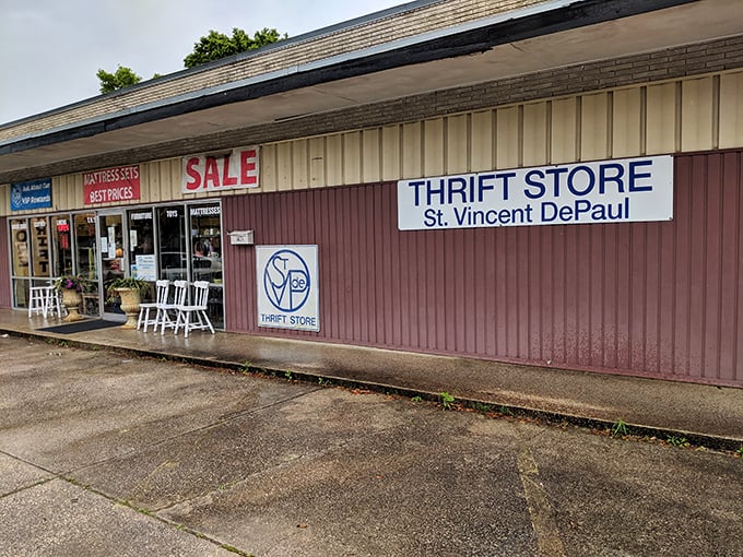Racks upon racks of clothing possibilities line this Pensacola thrift store, each hanger holding potential.