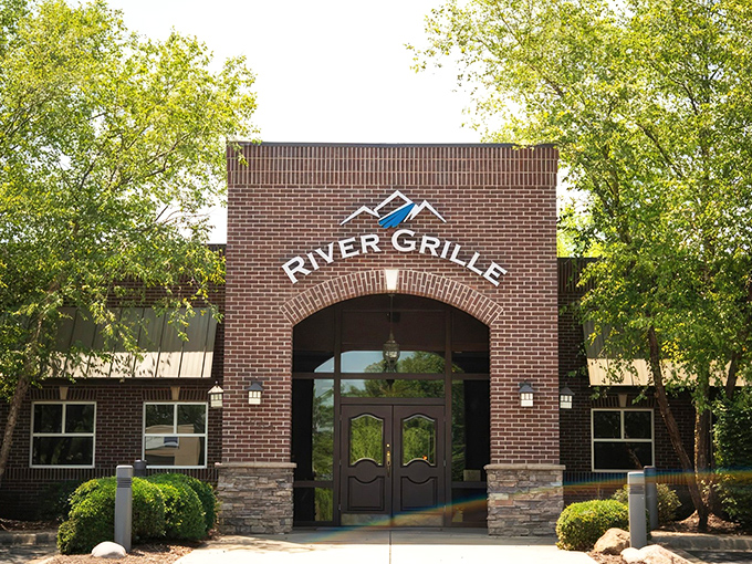 The brick façade of River Grille stands like a culinary fortress, promising treasures within that make the journey to Bentonville worthwhile.