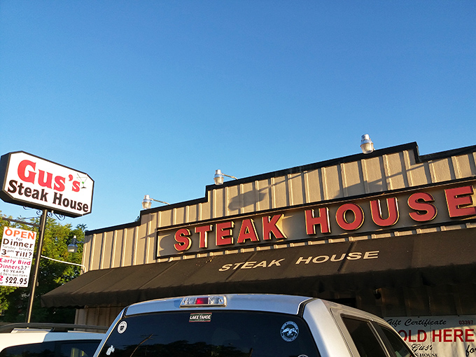The bold red lettering against the golden exterior isn't just signage—it's a beacon for carnivores, promising salvation from mediocre meals.