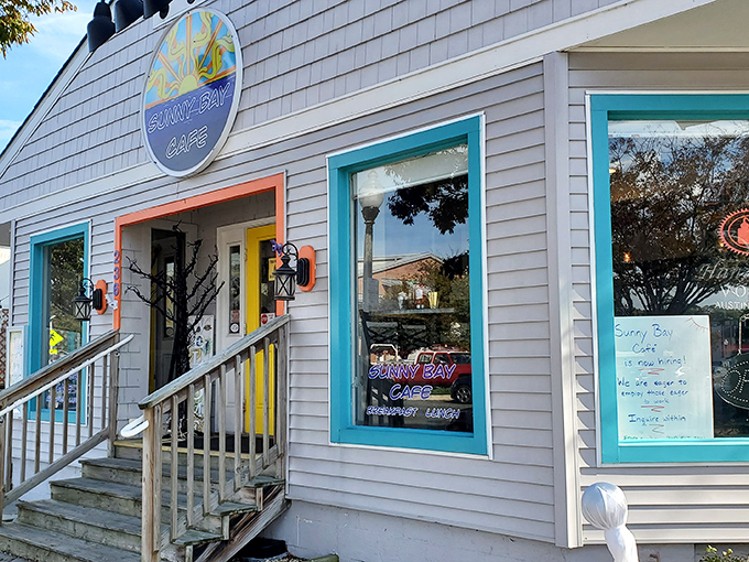 That bright yellow door isn't just welcoming visitors – it's practically begging you to come discover breakfast magic.