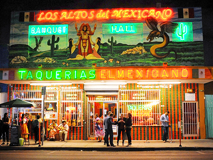 The vibrant mural above Taquerias El Mexicano isn't just decoration—it's a promise of the authentic flavors waiting inside this Little Havana landmark.