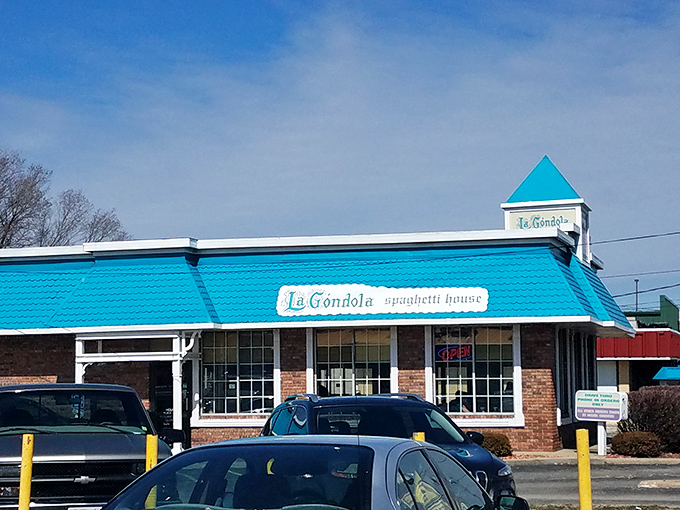 The iconic turquoise roof of La Gondola stands out like a pasta-lover's lighthouse, beckoning hungry travelers with promises of spaghetti salvation in Decatur.