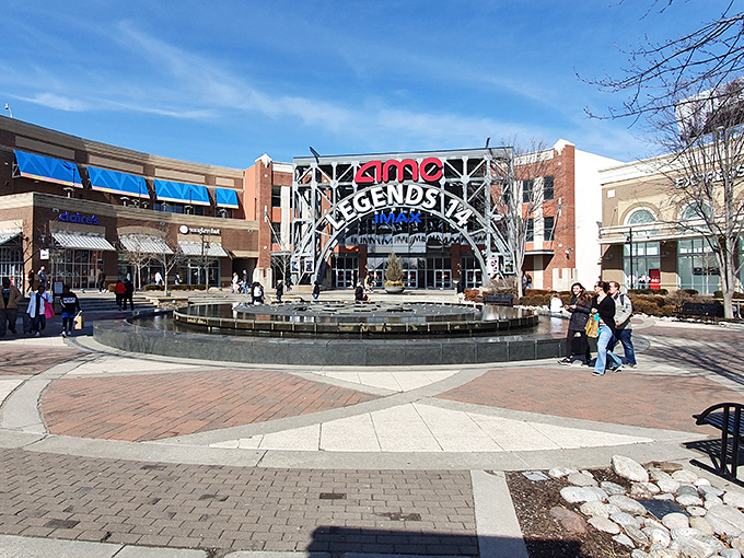 The grand entrance to Legends Outlets welcomes bargain hunters with architectural flair and a promise of retail adventure that won't require a second mortgage.