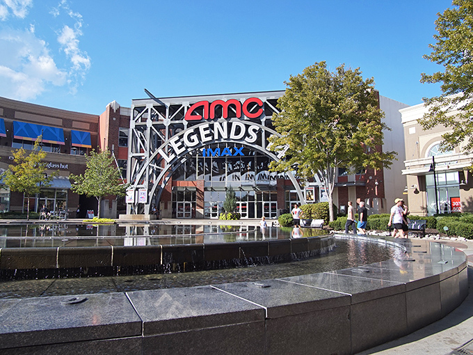 The grand entrance to Legends Outlets welcomes bargain hunters with architectural flair and a promise of retail adventure that won't require a second mortgage.