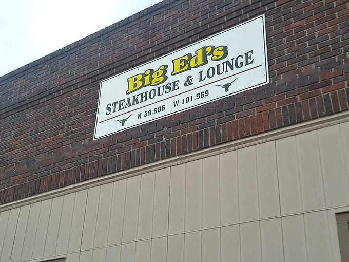 The GPS coordinates on Big Ed's sign aren't just for show—they're coordinates to carnivorous paradise in Bird City, where steak pilgrims navigate by satellite.
