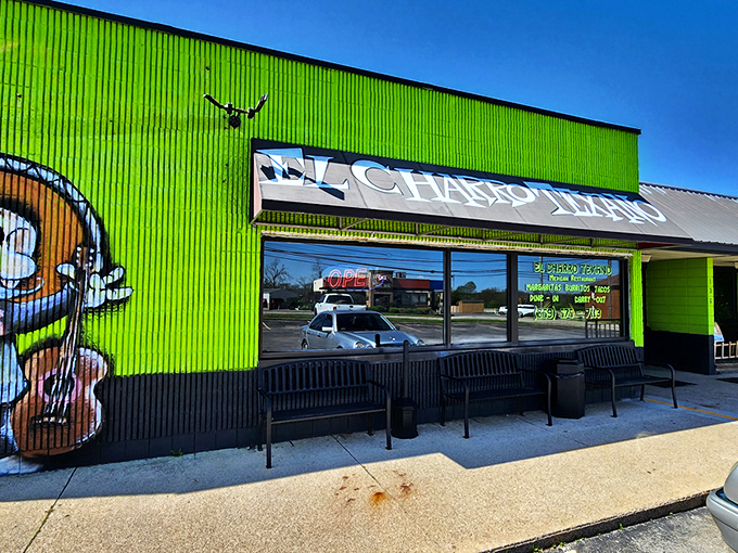 The lime-green exterior of El Charro Texano isn't just eye-catching—it's practically a landmark. These vibrant murals tell you immediately: this isn't your average taco joint.