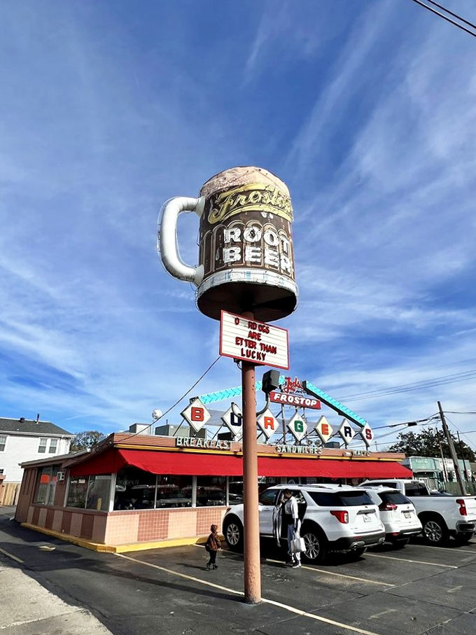 That iconic blue and red Frostop sign isn't just a landmark—it's a promise of burger bliss waiting just beyond those doors.