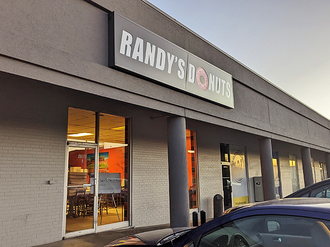 The iconic giant donut sign at Randy's isn't just a landmark—it's a beacon of hope for those suffering from acute pastry deficiency. 