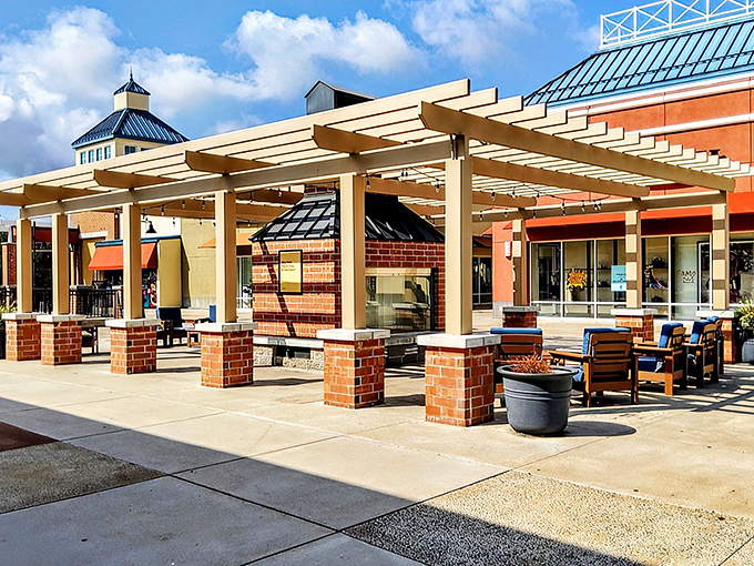 The brick facade of Philadelphia Premium Outlets welcomes bargain hunters like an old friend promising treasures within. LOFT beckons from just beyond the entrance.
