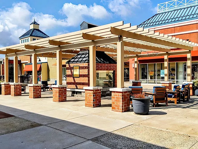 The brick facade of Philadelphia Premium Outlets welcomes bargain hunters like an old friend promising treasures within. LOFT beckons from just beyond the entrance.