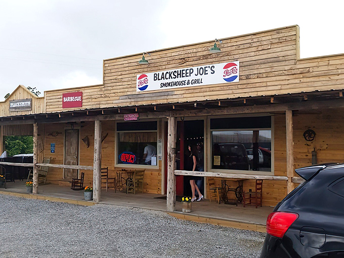 The weathered wooden exterior of Blacksheep BBQ isn't trying to impress anyone—until that hickory aroma hits you and changes everything.