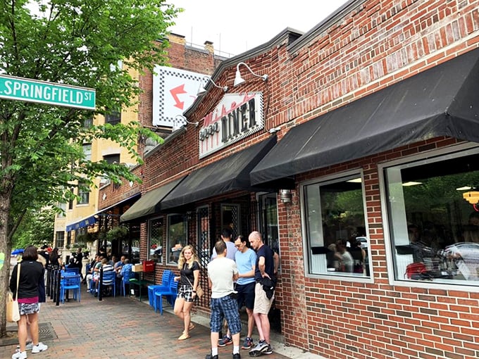 The brick façade of Mike's City Diner stands like a beacon of breakfast hope on Washington Street, promising culinary salvation to hungry Bostonians.