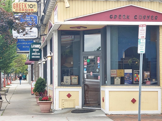 The unassuming yellow façade of Greek Corner stands like a beacon of Mediterranean promise on Massachusetts Avenue. Culinary treasures await inside!