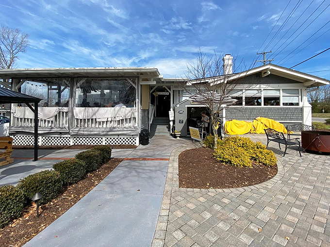 Those bright yellow doors aren't just a design choice—they're a beacon calling breakfast lovers home to this charming Virginia Beach cottage.