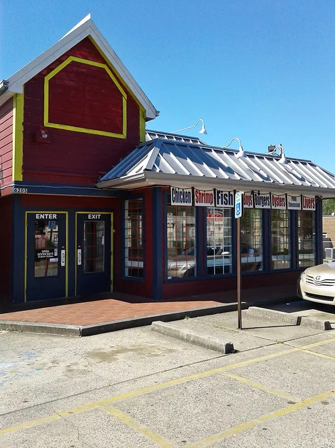 The bright red exterior with yellow trim isn't trying to be subtle. Like a Southern grandma, it proudly announces: "I've got something good for you!