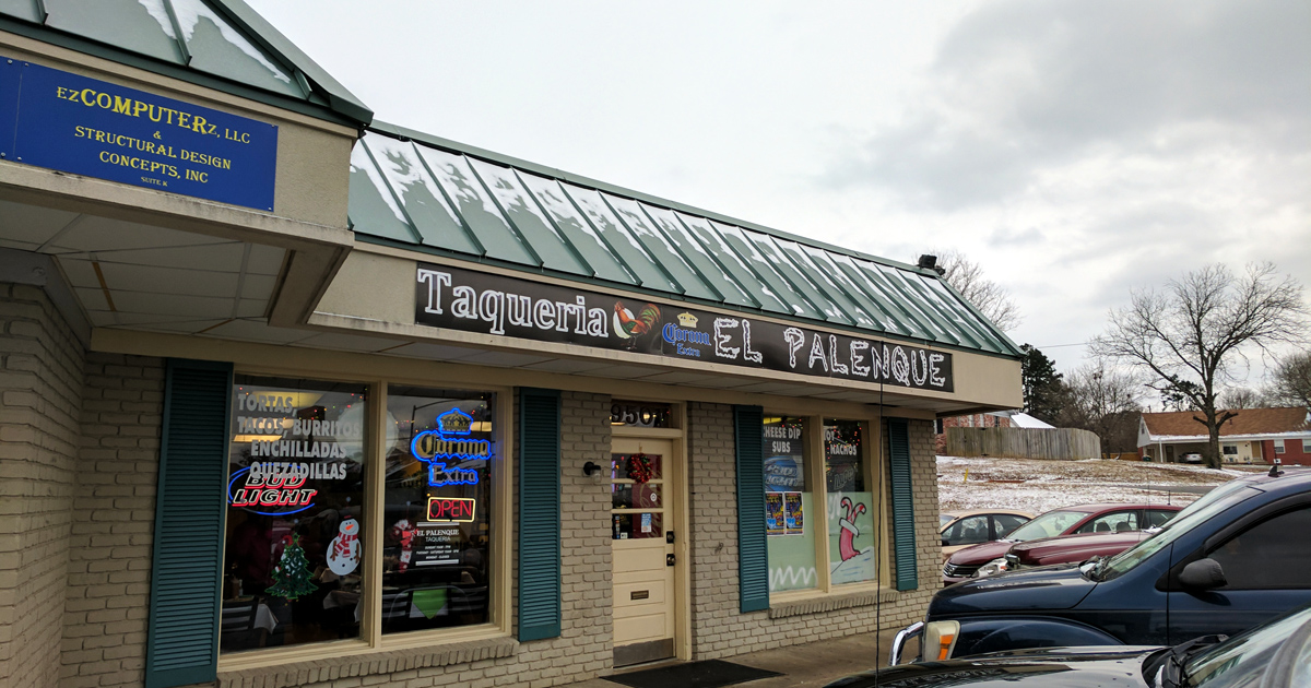 The unassuming exterior of El Palenque proves once again that culinary treasures often hide behind the most modest facades. Teal shutters and all.