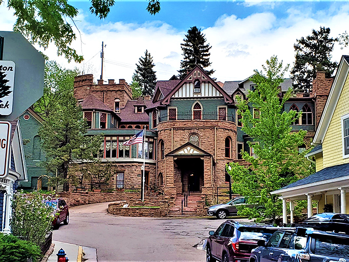 Miramont Castle rises from the Colorado landscape like an architectural fever dream, blending nine different styles into one magnificent stone masterpiece.