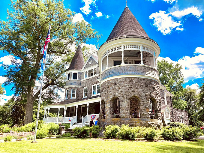 The Marshall mansion stands like a Victorian dream, its turrets and wraparound porch inviting you to step back into a more elegant era.
