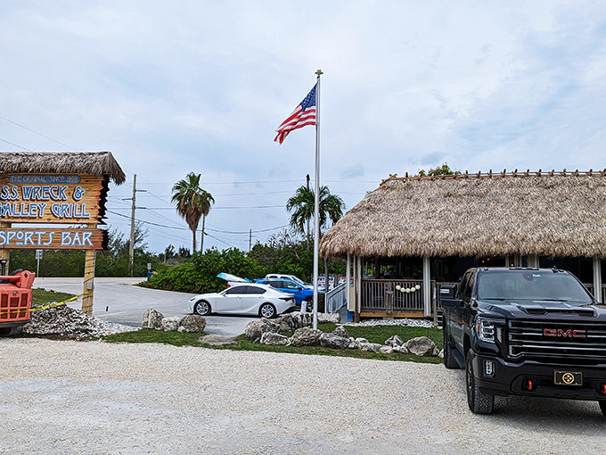 The thatched roof and blue ramp welcome you like an old friend. This is Florida Keys authenticity at its finest—no pretense, just promises of great food ahead.
