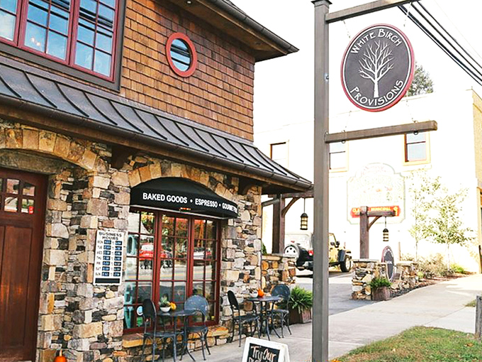 Storybook charm meets serious coffee credentials at White Birch Provisions. The stone-and-cedar shake exterior with those whimsical round windows practically whispers, "Come inside, the coffee's extraordinary."