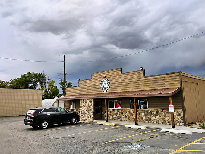 The unassuming exterior of Off The Rails Cafe stands like a culinary frontier outpost, promising hearty delights within those rustic wooden walls.