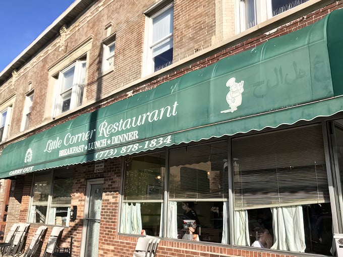 The emerald awning stands like a beacon of comfort on this Chicago street corner, promising simple pleasures without pretension.