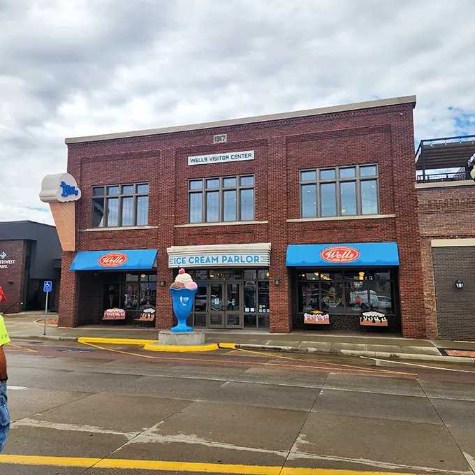 The brick façade of Wells Visitor Center stands proudly in downtown Le Mars, with that giant ice cream cone sculpture practically winking at passersby.