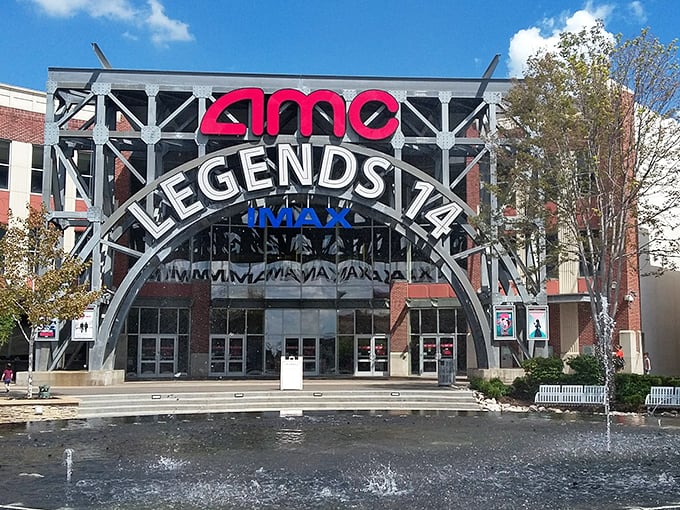 The grand entrance to Legends Outlets welcomes bargain hunters with architectural flair and a promise of retail adventure that won't require a second mortgage.