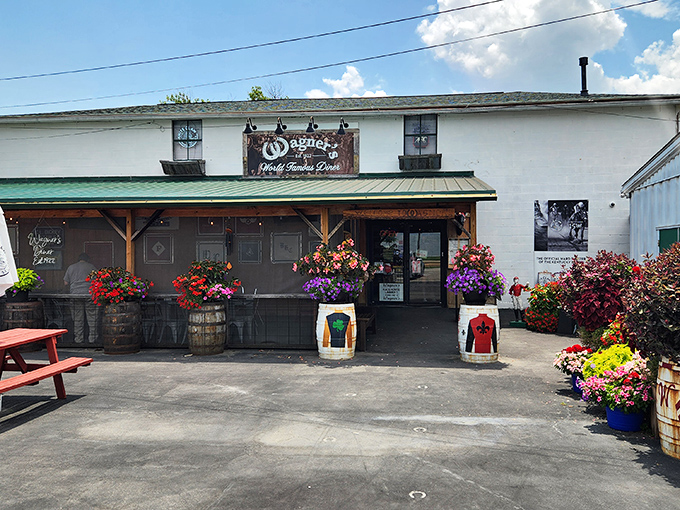 Wagner's exterior welcomes you with rustic charm and flower-filled barrels – like your favorite aunt's porch, if your aunt lived next door to Churchill Downs.