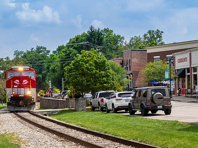 The quintessential small-town moment: a bright red locomotive rumbling past historic storefronts. Midway's railroad heritage isn't just preserved—it's still very much alive!