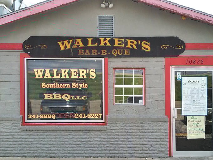 Walker's BBQ stands like a smoke-scented beacon of hope for hungry travelers. That massive smoker isn't just equipment—it's a declaration of serious barbecue intentions.