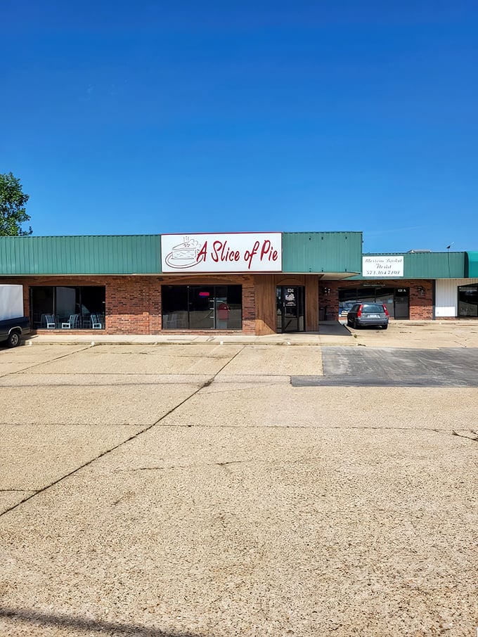 The unassuming storefront of A Slice of Pie belies the culinary magic happening inside. Like finding treasure in a strip mall. 