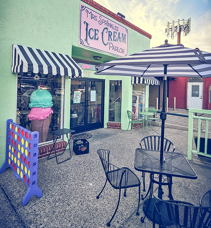 That mint-green facade with classic black and white awnings isn't just a building—it's a portal to simpler, sweeter times in Albuquerque.
