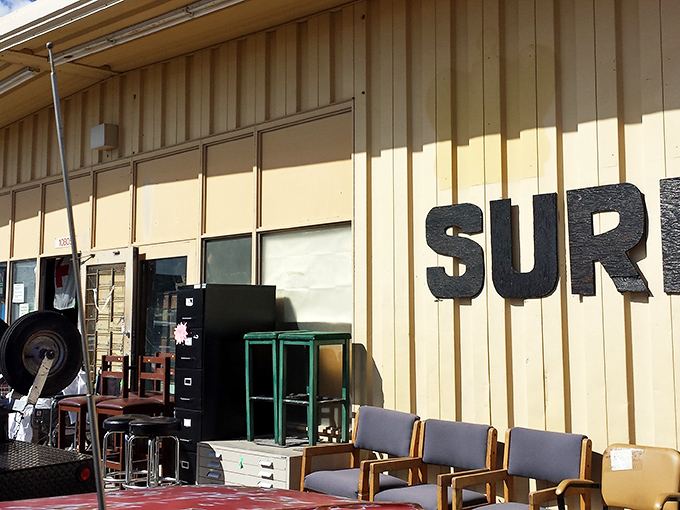 The unassuming exterior of Surplus City belies the wonderland within. Like a desert mirage, treasures await behind these beige walls.
