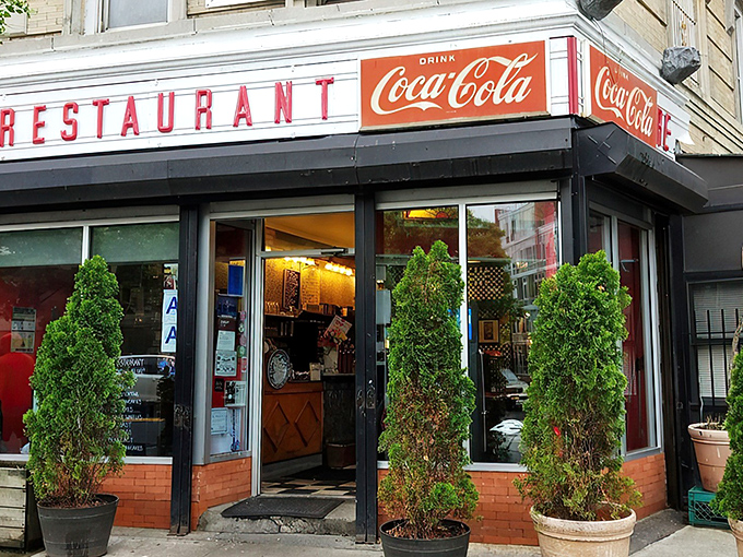 That classic corner storefront isn't just architectural eye candy—it's a beacon of breakfast hope on Washington Avenue, promising pancake nirvana inside.