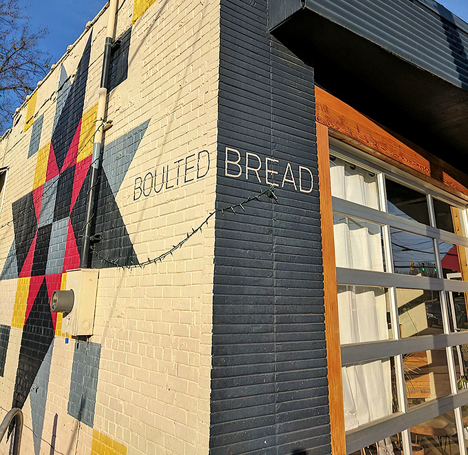 Impossible to miss with its bold geometric mural, Boulted Bread's exterior isn't just Instagram-worthy—it's an artistic prelude to the culinary masterpieces waiting inside.