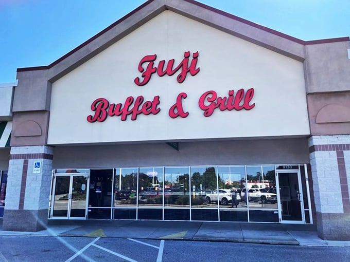The bold red lettering of Fuji Buffet & Grill beckons like a siren song to hungry travelers on Mentor Avenue. Your stomach knows what that sign promises.