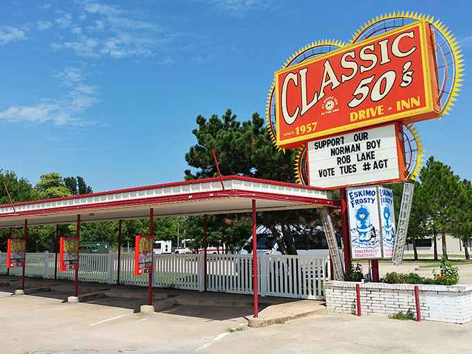 That iconic neon sign isn't just advertising – it's a time machine promising juicy burgers and nostalgia served in equal portions.