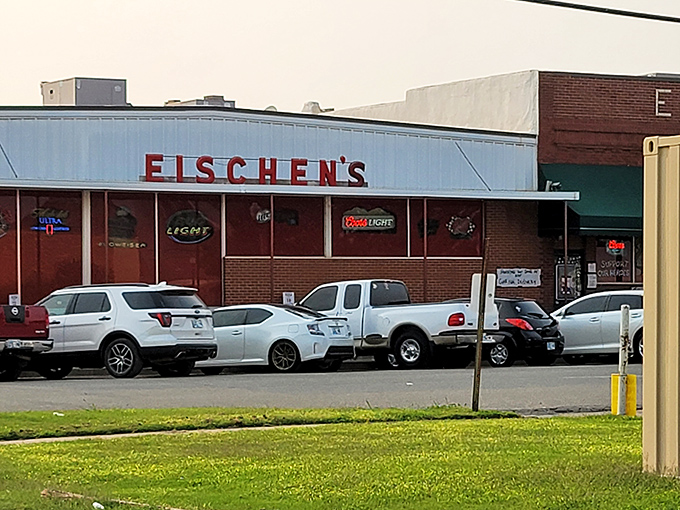 The unassuming exterior of Eischen's Bar hides Oklahoma's worst-kept culinary secret. Packed parking lot tells the real story—people know where the good stuff is.