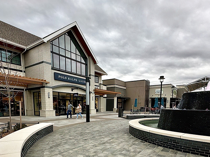 The modern façade of Tulsa Premium Outlets welcomes bargain hunters with its clean lines and inviting walkways—retail therapy's promised land in Jenks.